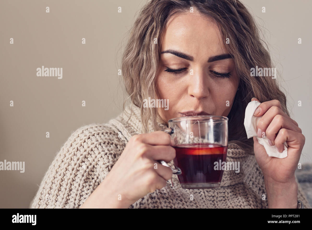 Flu cold or allergy symptom. Sick young woman with fever sneezing in ...