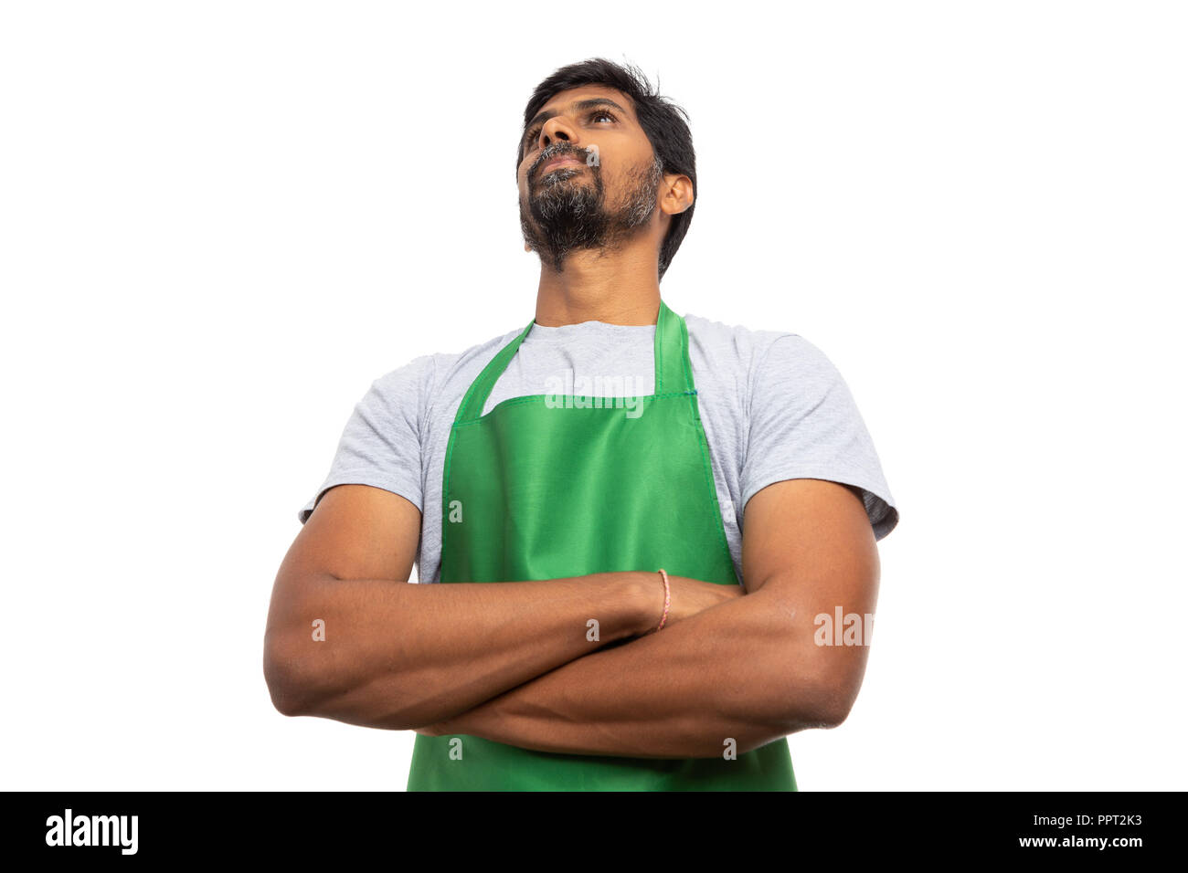 Low angle hero shot of indian supermarketor hypermarket employee ...