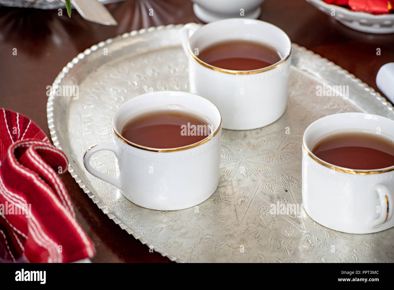 Three cups a tea hi-res stock photography and images - Alamy