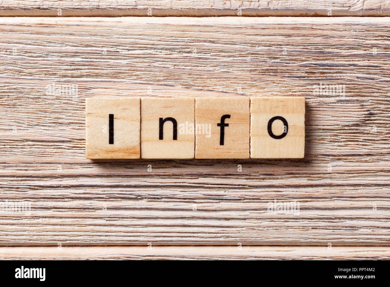 Info word written on wood block. Info text on table, concept Stock ...