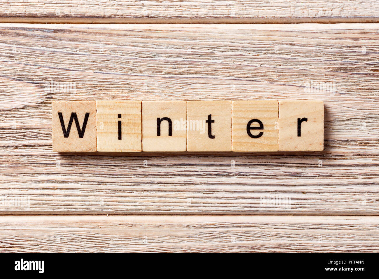 winter word written on wood block. winter text on table, concept Stock ...