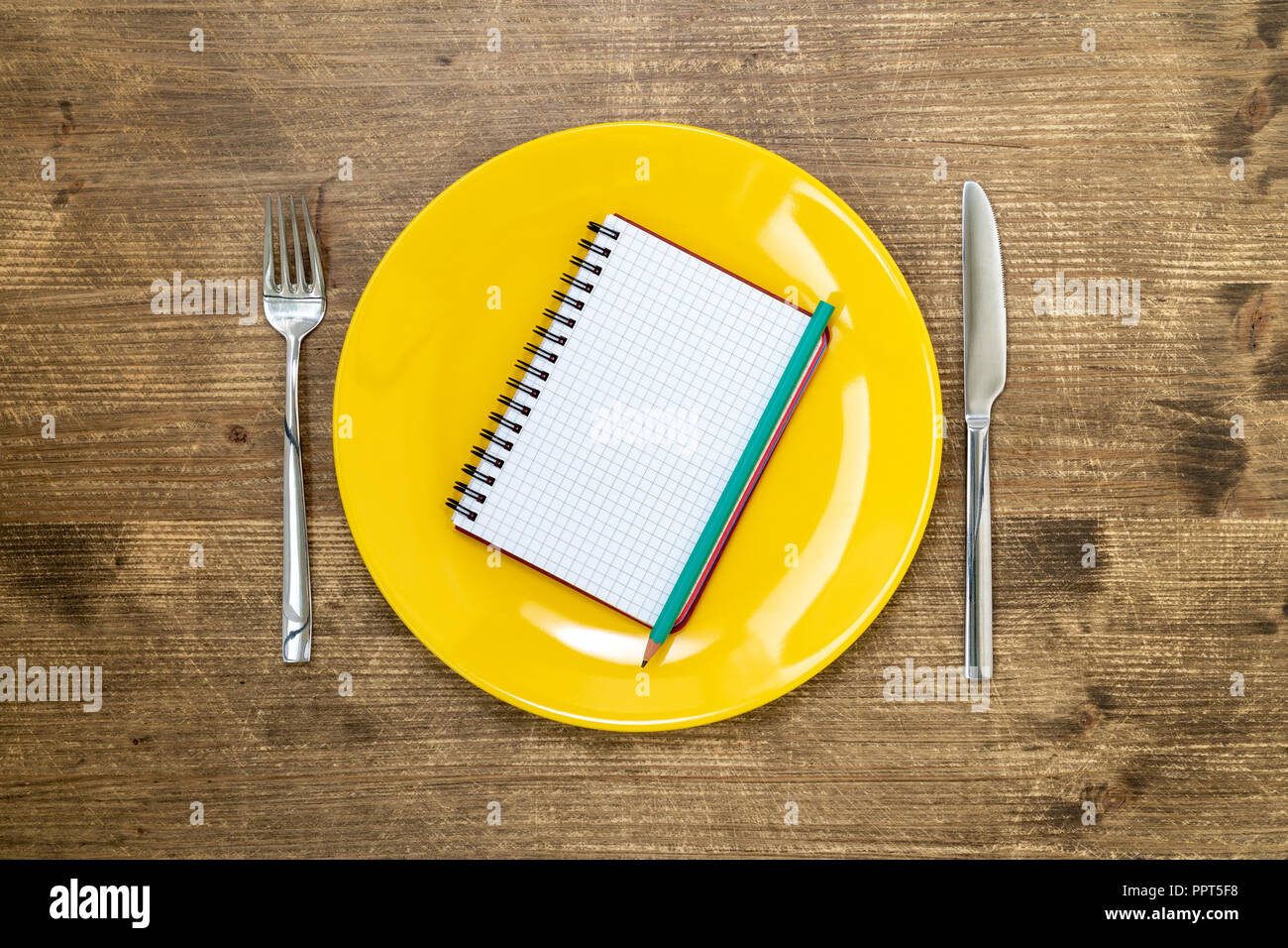 Yellow plate with open notebook for notes. Menu template Stock Photo ...