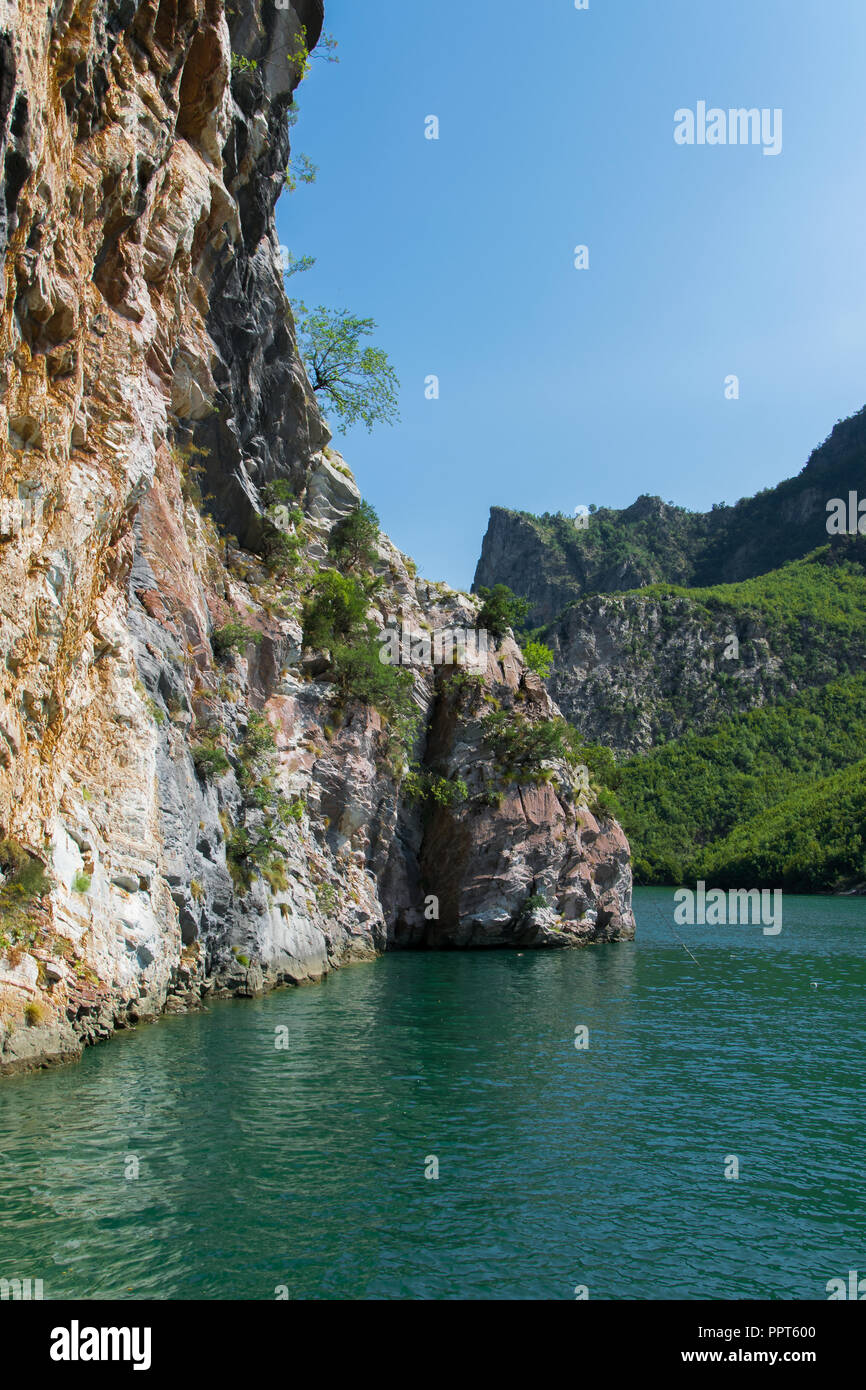 Narrow valley, completely taken up by the river, surrounded by dense ...
