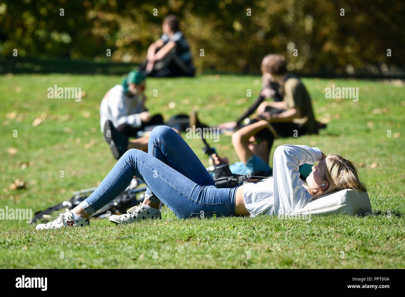 People relax in the sun at Castle Park, Bristol Stock Photo - Alamy