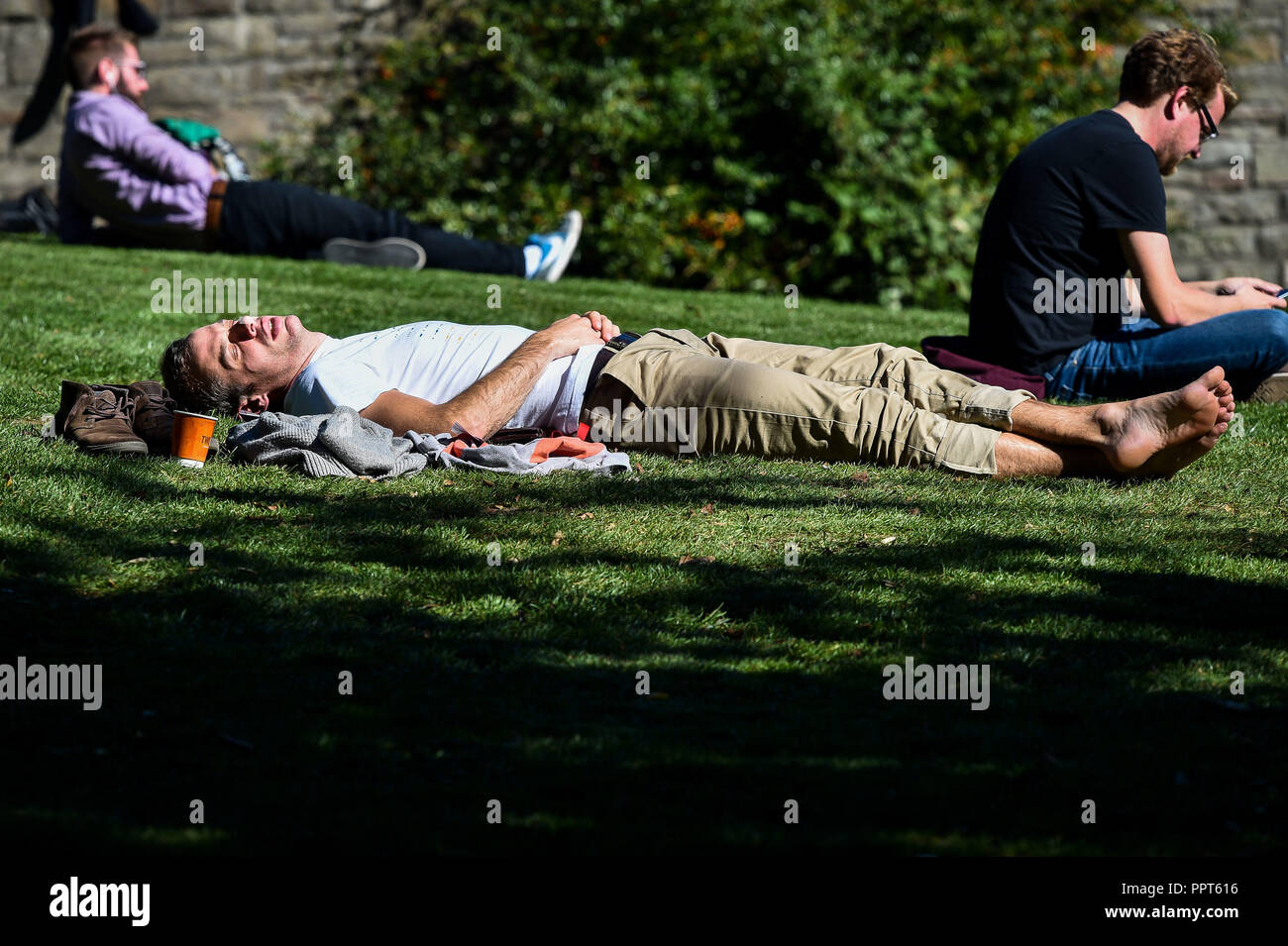 People relax in the sun at Castle Park, Bristol Stock Photo - Alamy