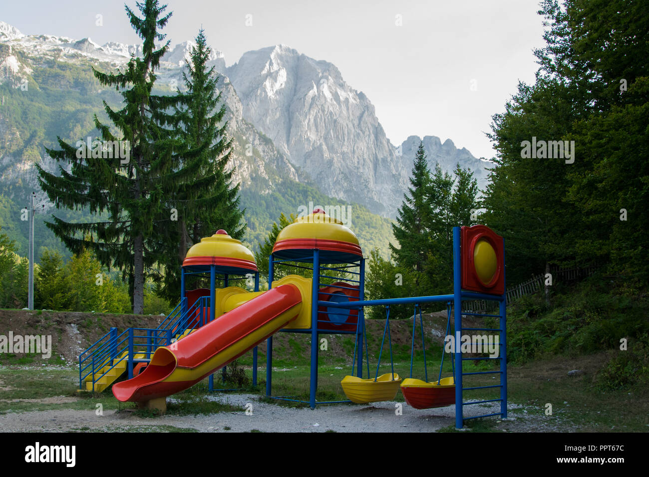 Children playground in the high mountain Alps Stock Photo - Alamy