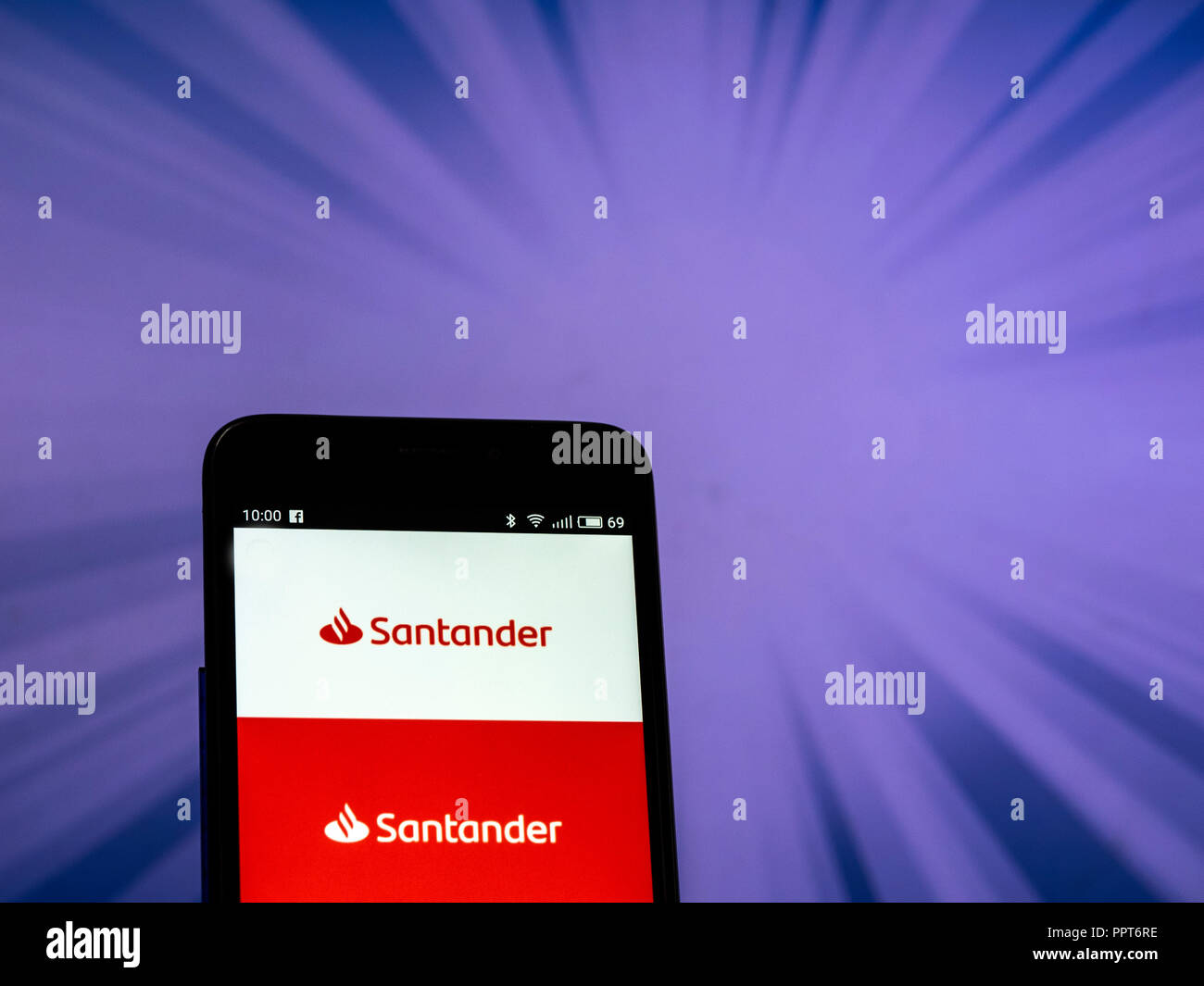 Banco Santander logo seen displayed on smart phone. Santander Group is ...