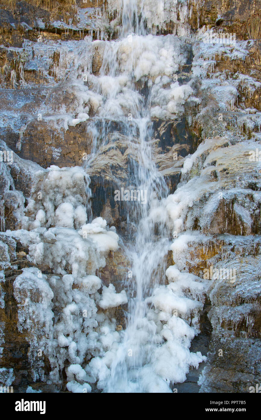 Nature power - close up of frozen natural mountain waterfall Stock ...