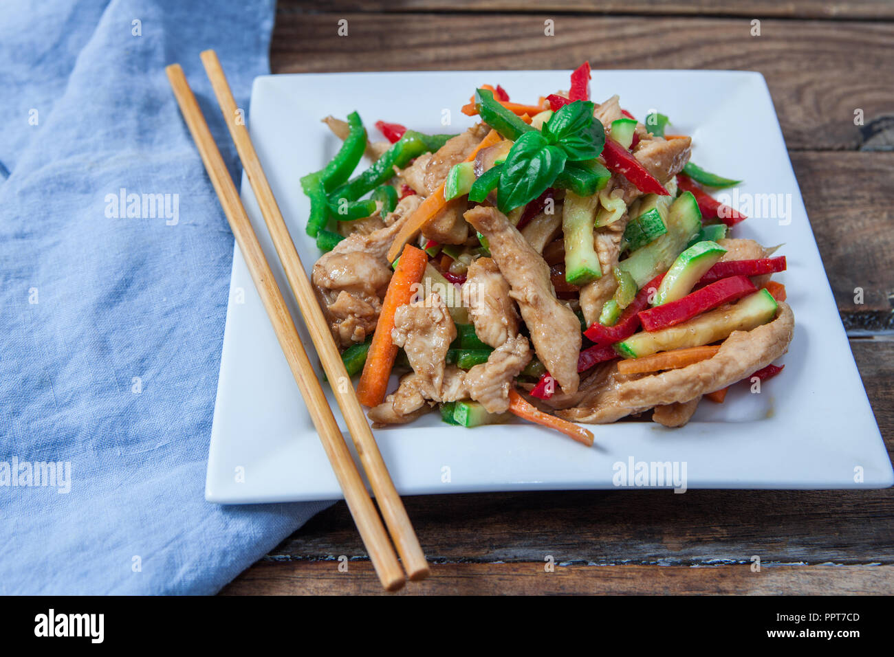 chicken and vegetables on wok with soya sauce Stock Photo - Alamy