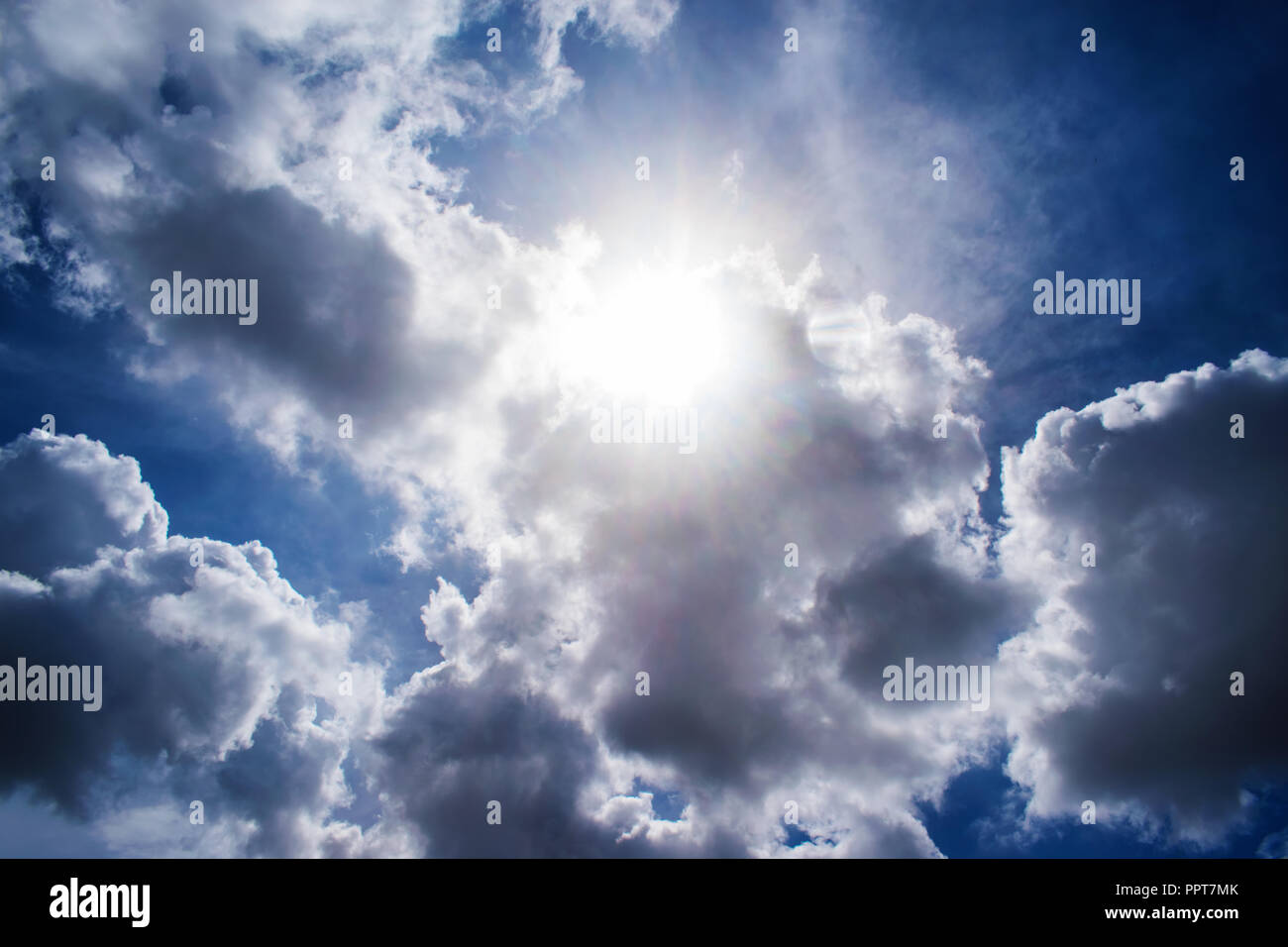 Facing the Sun. Looking at the Sun as it gets exposed from the clouds ...