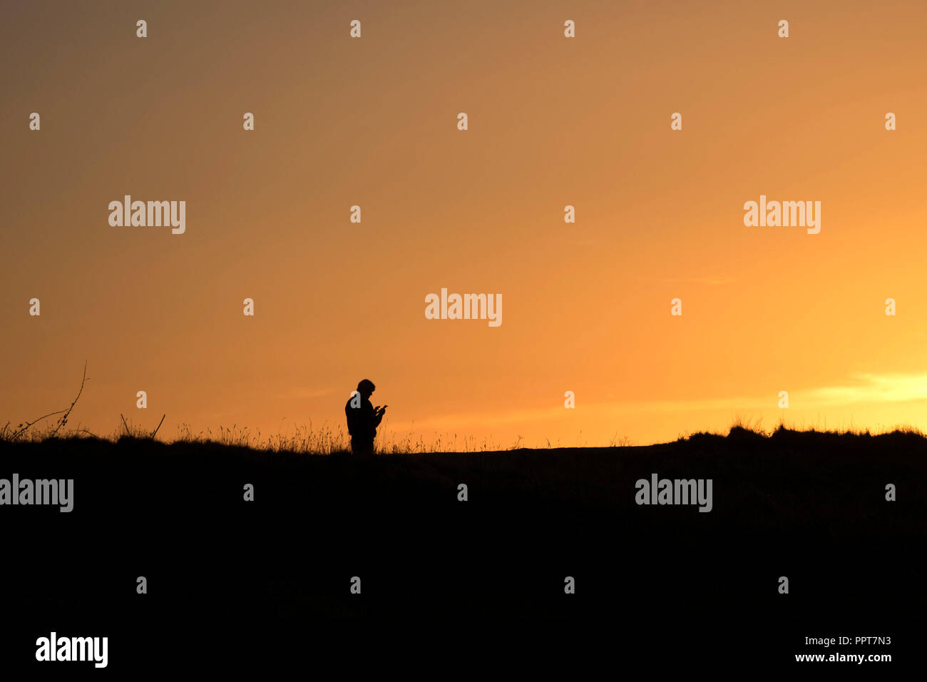 Sunset sky figure hi-res stock photography and images - Alamy