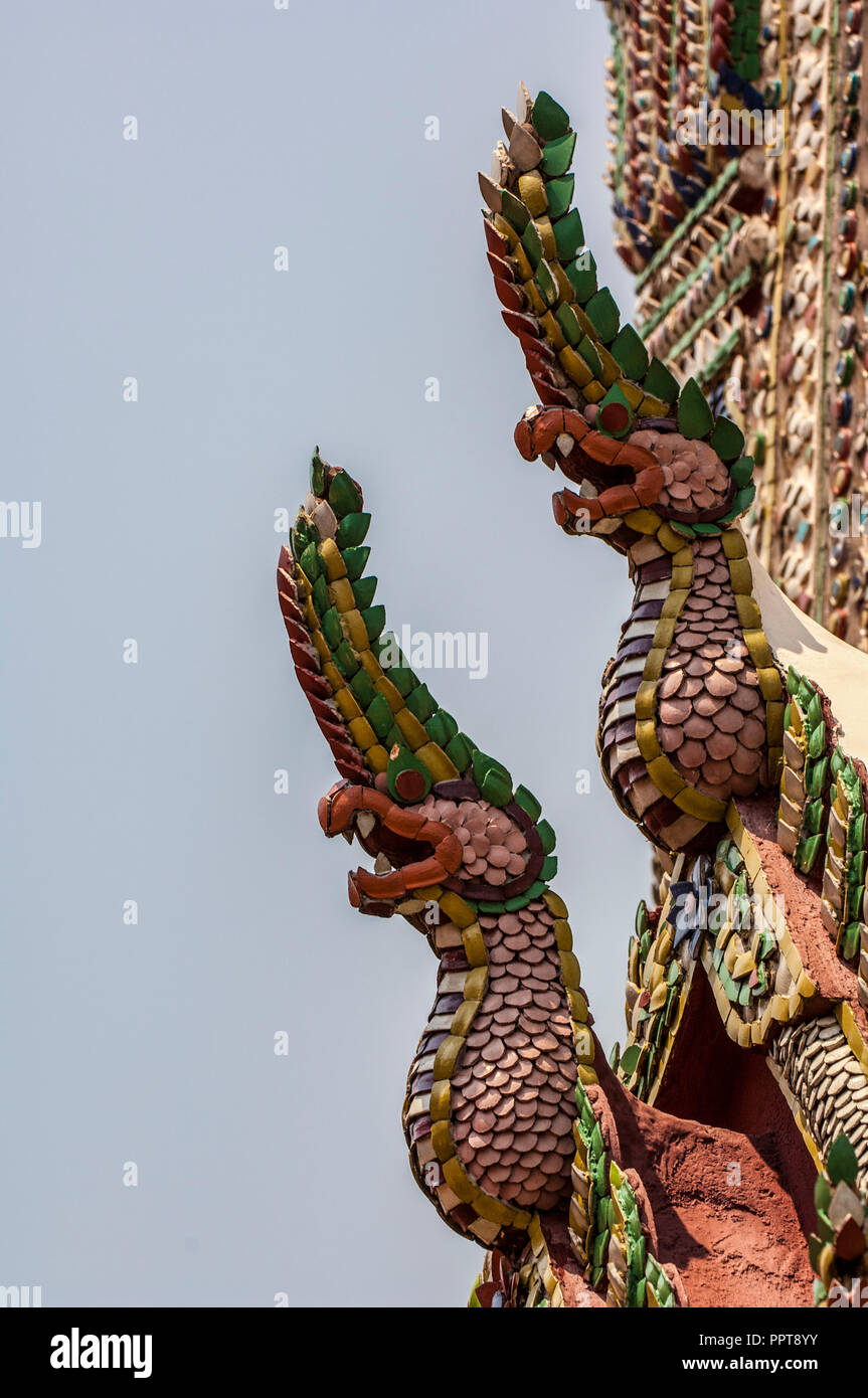 Ceramic decoration of mythical creatures on a building at Wat Pho, in ...