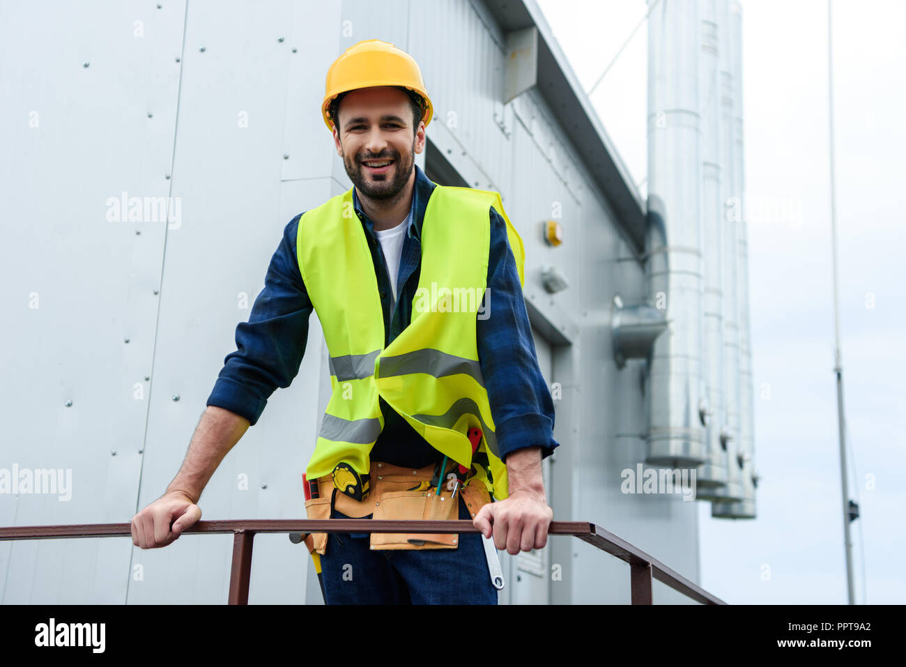 Construction worker vest tool belt hi-res stock photography and images ...