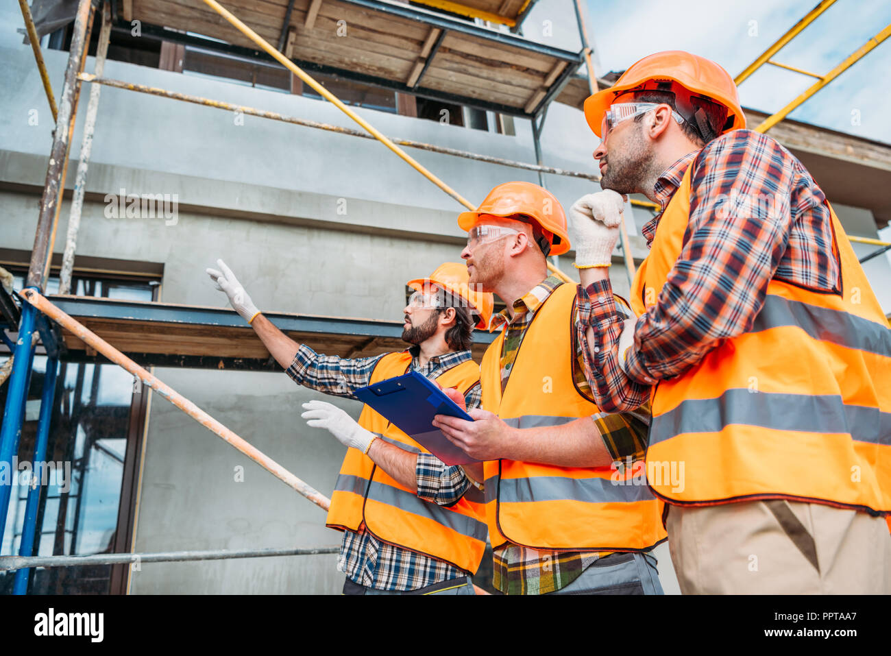 Builders in hard hats hi-res stock photography and images - Alamy