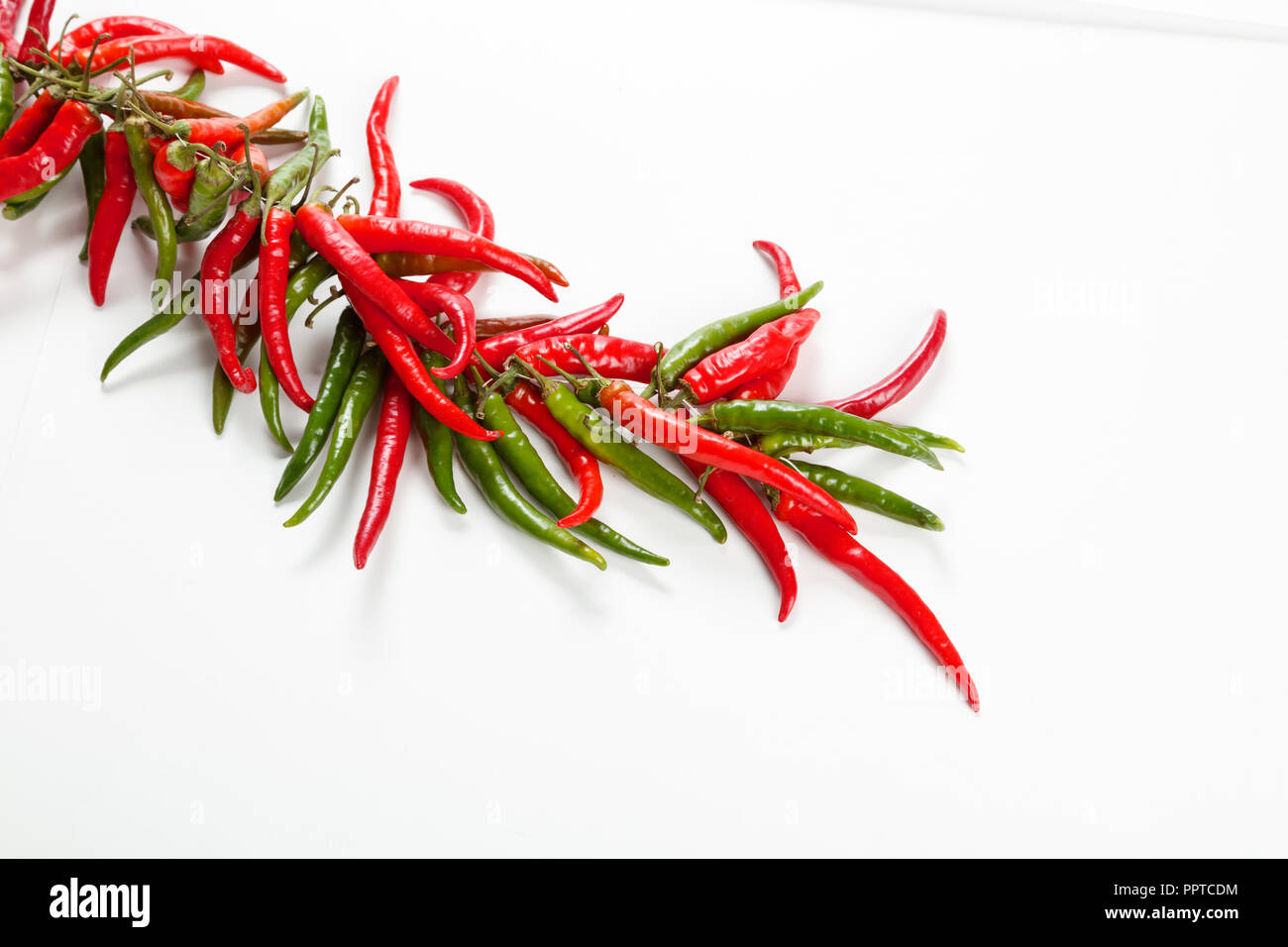 Hot red chili or chilli pepper ristra Stock Photo - Alamy
