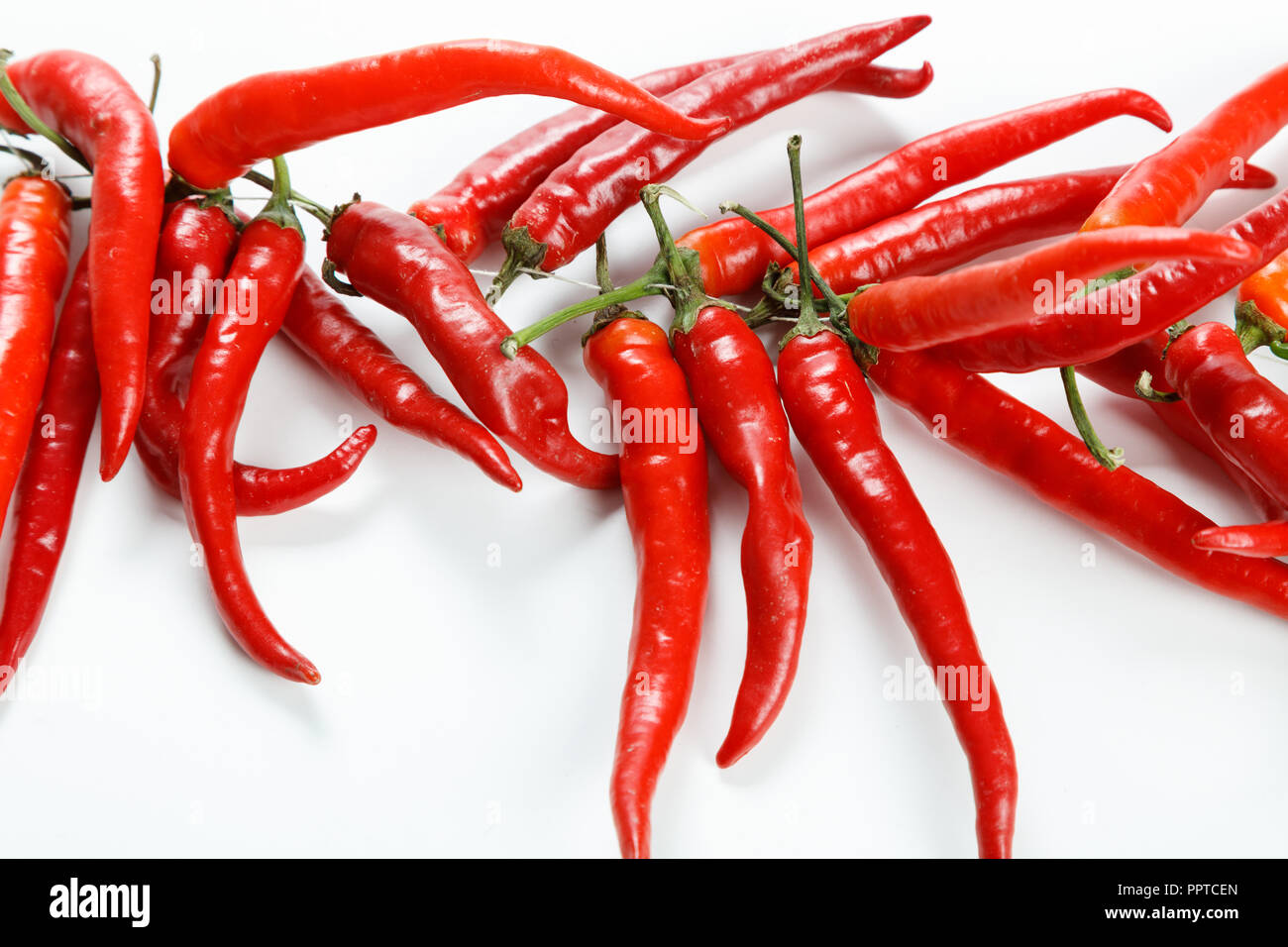 Hot red chili or chilli pepper ristra Stock Photo - Alamy