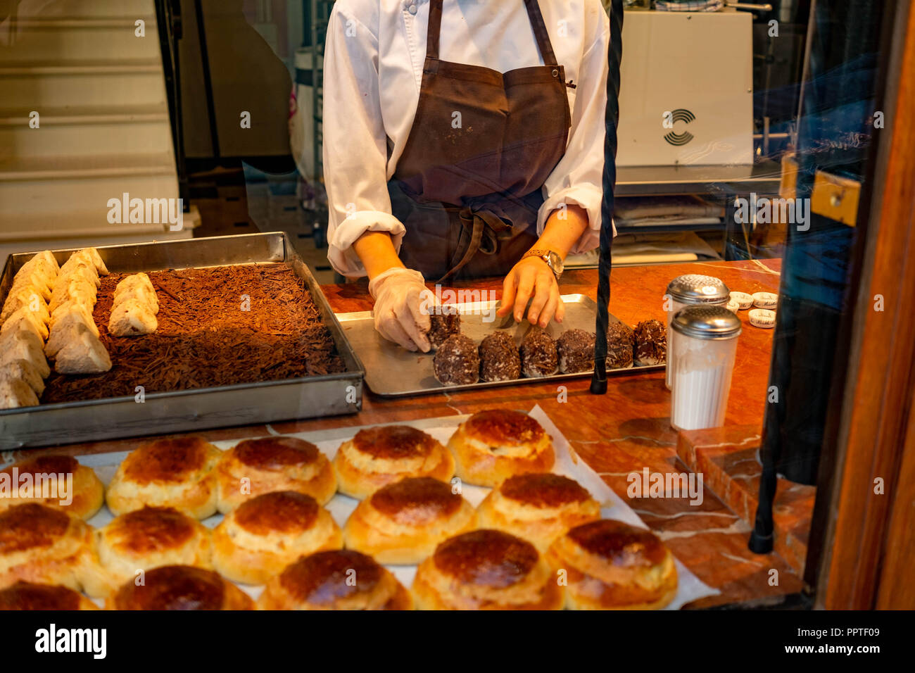 Baker Working in Bakery Stock Photo - Alamy