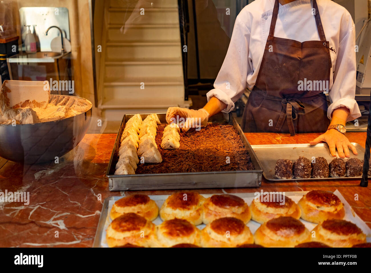 Baker Working in Bakery Stock Photo - Alamy