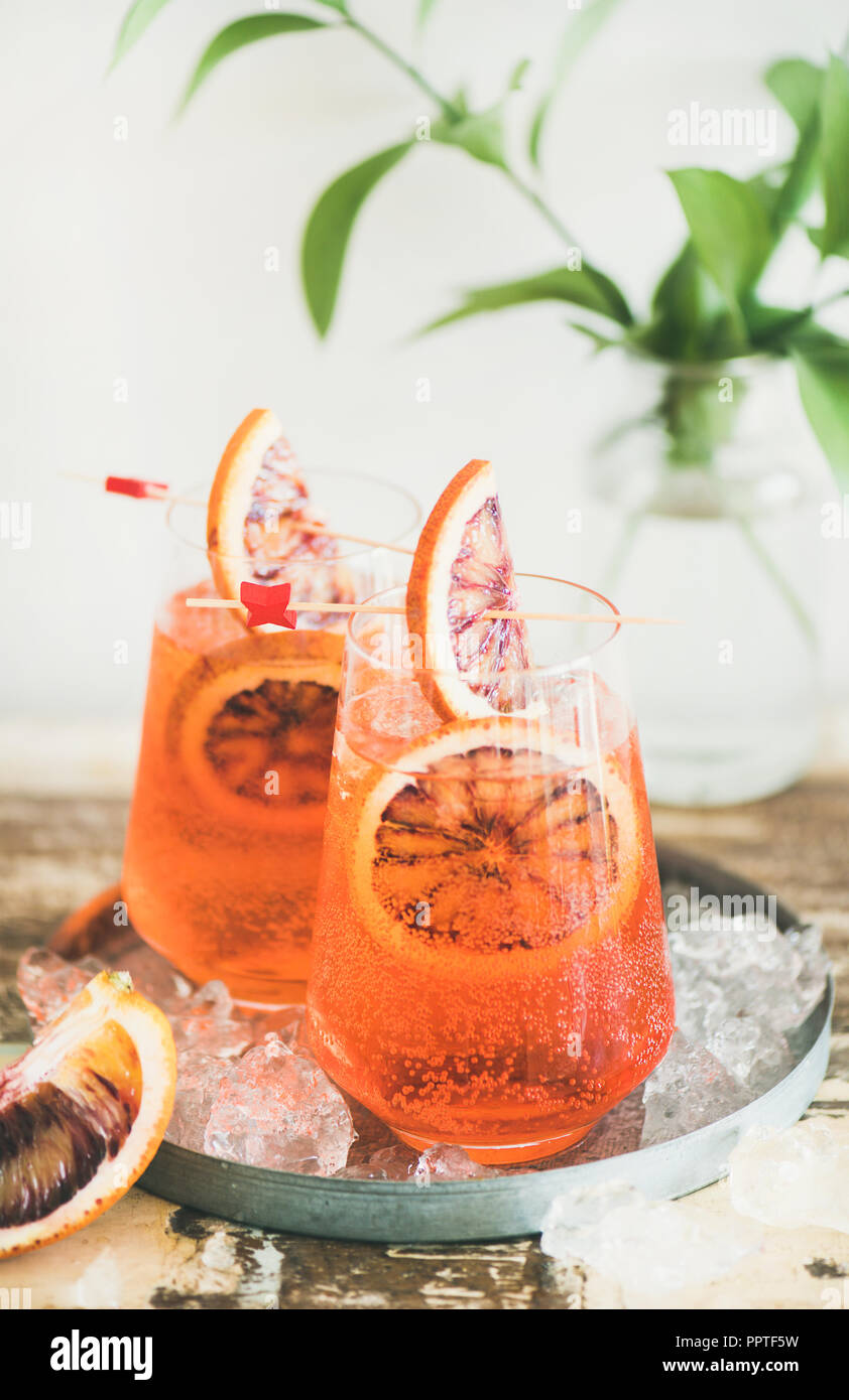 Aperol Spritz cocktail drink with orange and ice in glasses Stock Photo ...