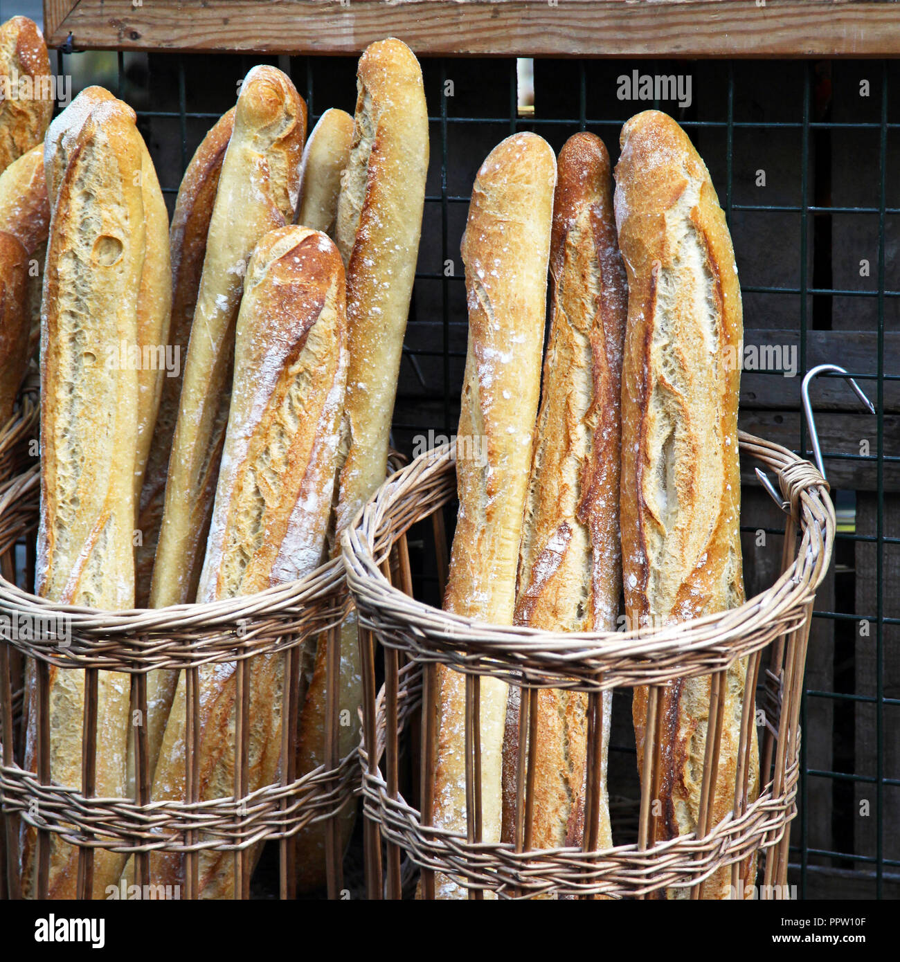 Traditional crusty French baguette bread in baskets Stock Photo - Alamy