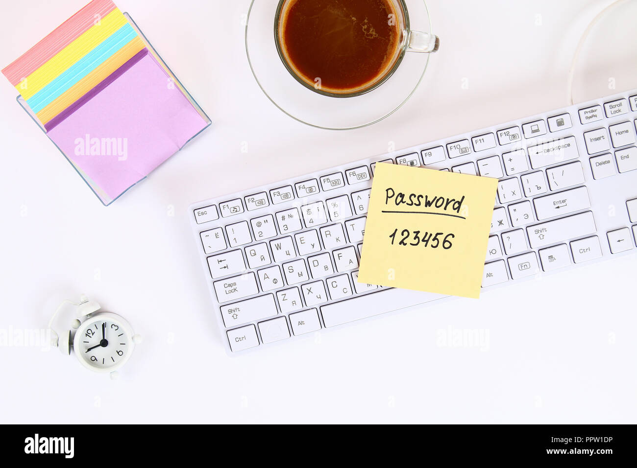 The password on the sticker is a note on the white desktop next to the ...