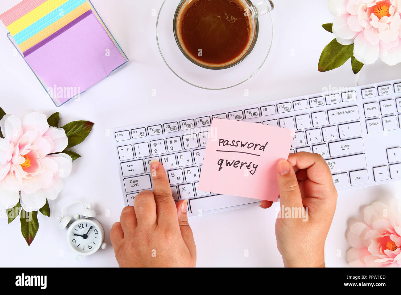 The password on the sticker is a note on the white desktop next to the ...