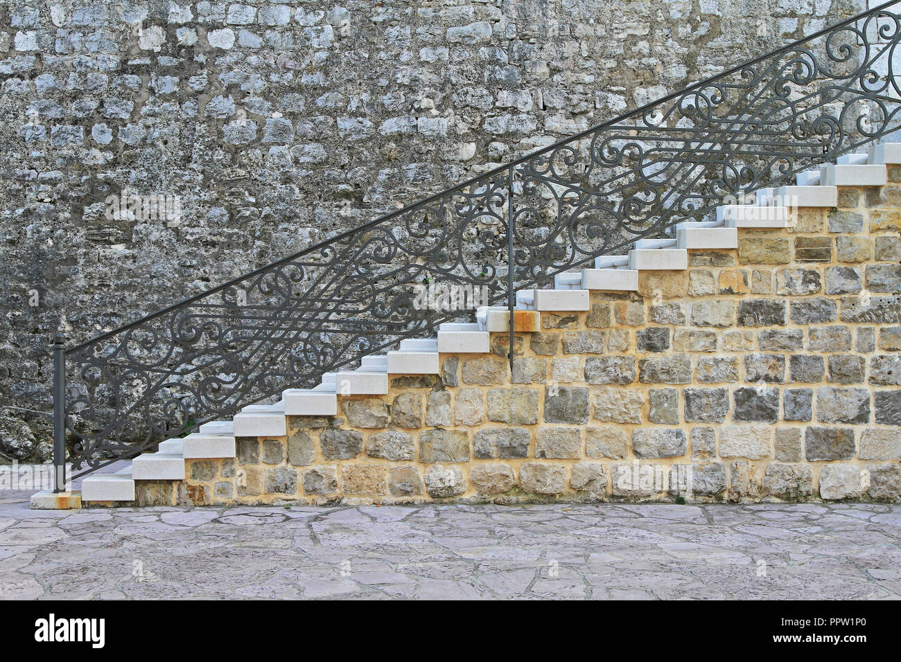 Medieval stone stairway with iron work fence Stock Photo - Alamy