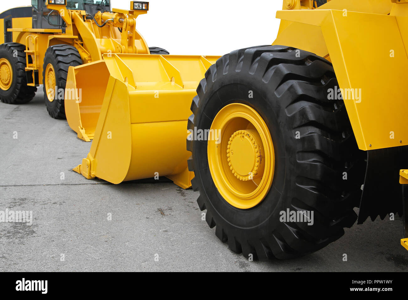 Yellow diggers hi-res stock photography and images - Alamy