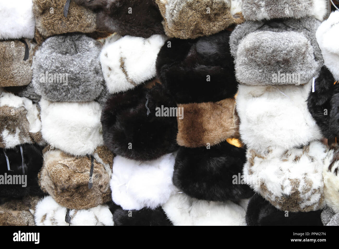 Various winter hats made from rabbit fur Stock Photo - Alamy