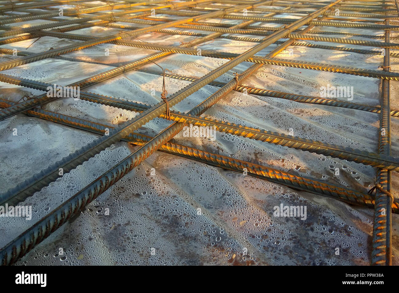 Construction workers fabricating steel reinforcement bar at the ...