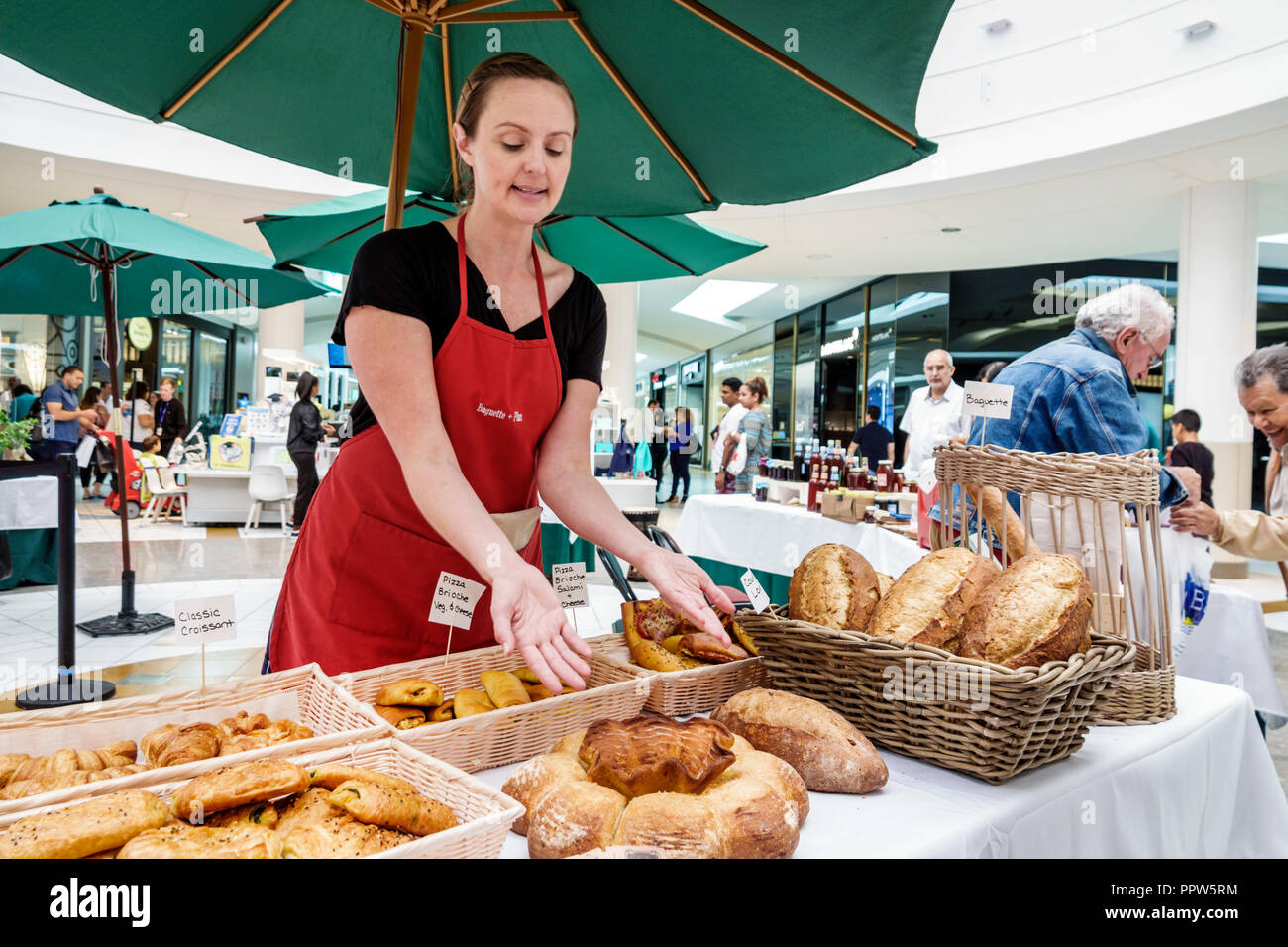 Miami Florida,Kendall,Dadeland mall,Baguette + Plus,bread vendor,woman ...