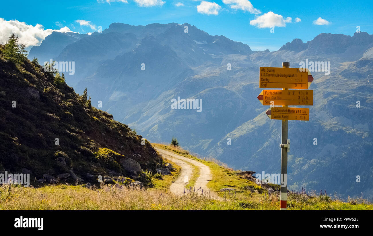 Typical yellow Swiss hiking signs near Fuorcla Surlej (Graubunden ...