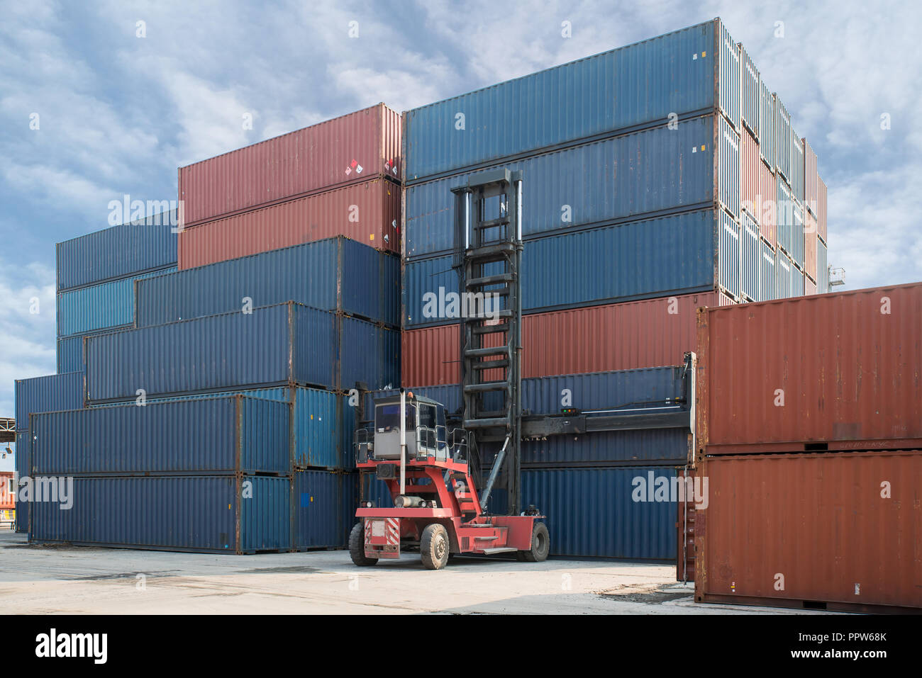 Forklift lifting container box loading to container depot use for cargo ...