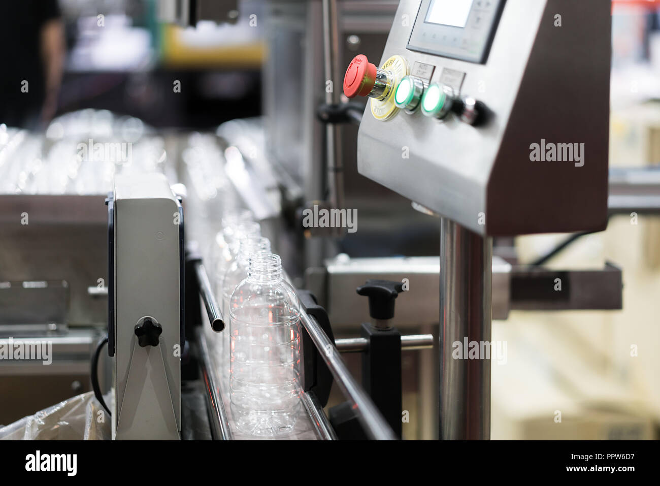 Clear Bottles transfer on Conveyor Belt System. Industrial and factory ...