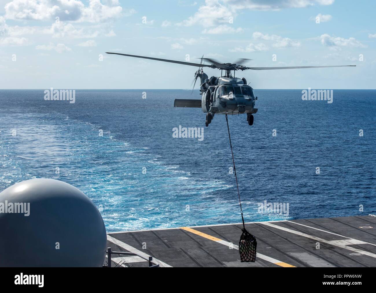 180922-N-ET513-0121 ATLANTIC OCEAN (Sept. 22, 2018) An MH-60S Sea Hawk ...