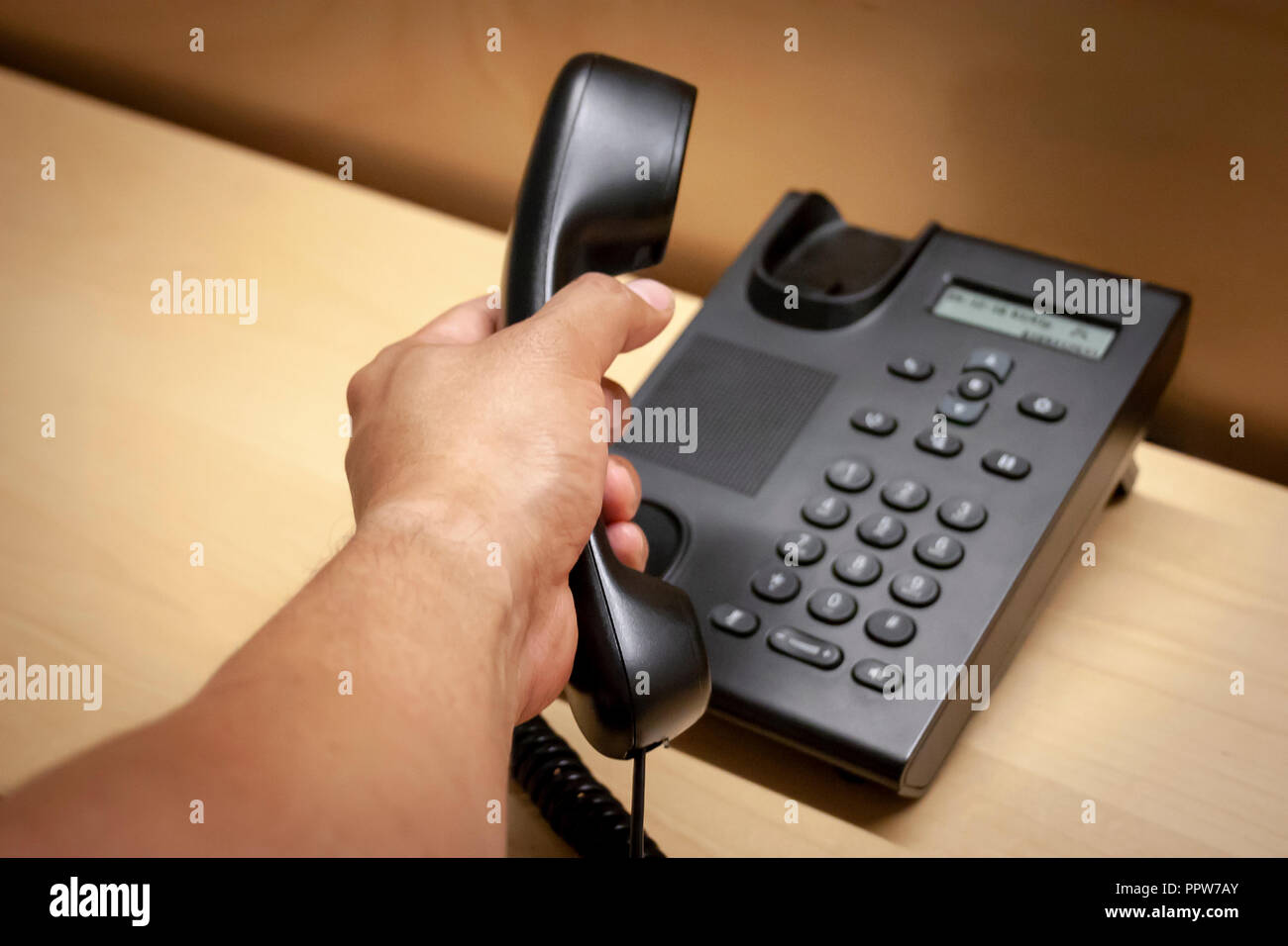 Answering a call hi-res stock photography and images - Alamy