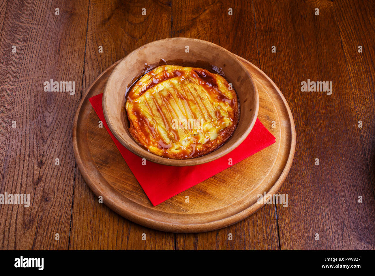 Sweet rice pudding baked in pottery. Sweet dish at the restaurant ...