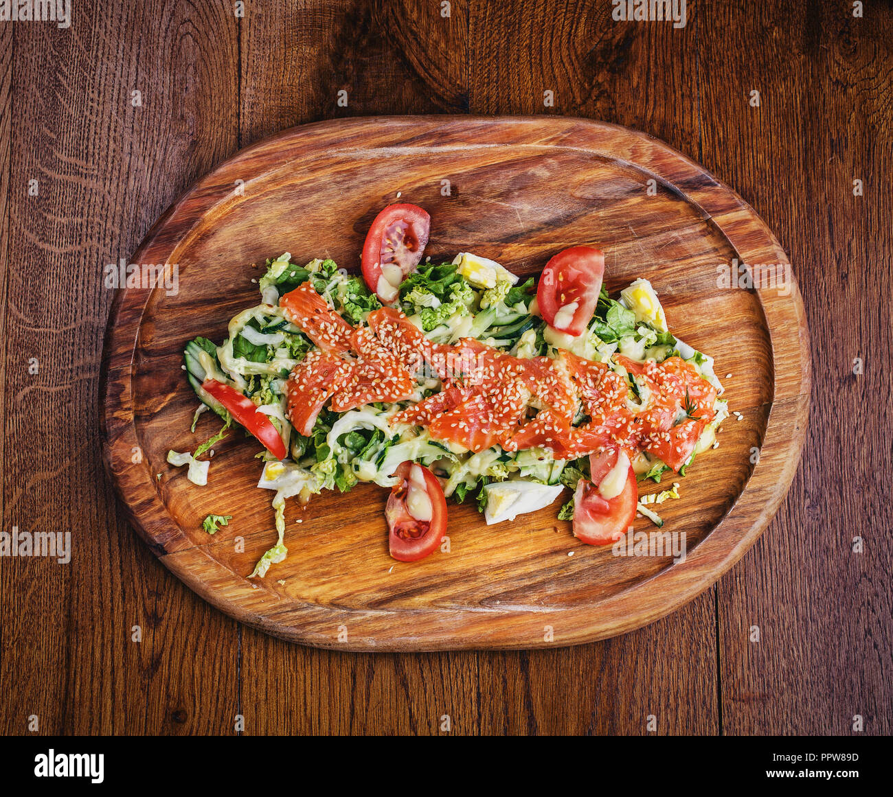 Summer dishes from: red fish, eggs, cucumbers, tomatoes salad and ...