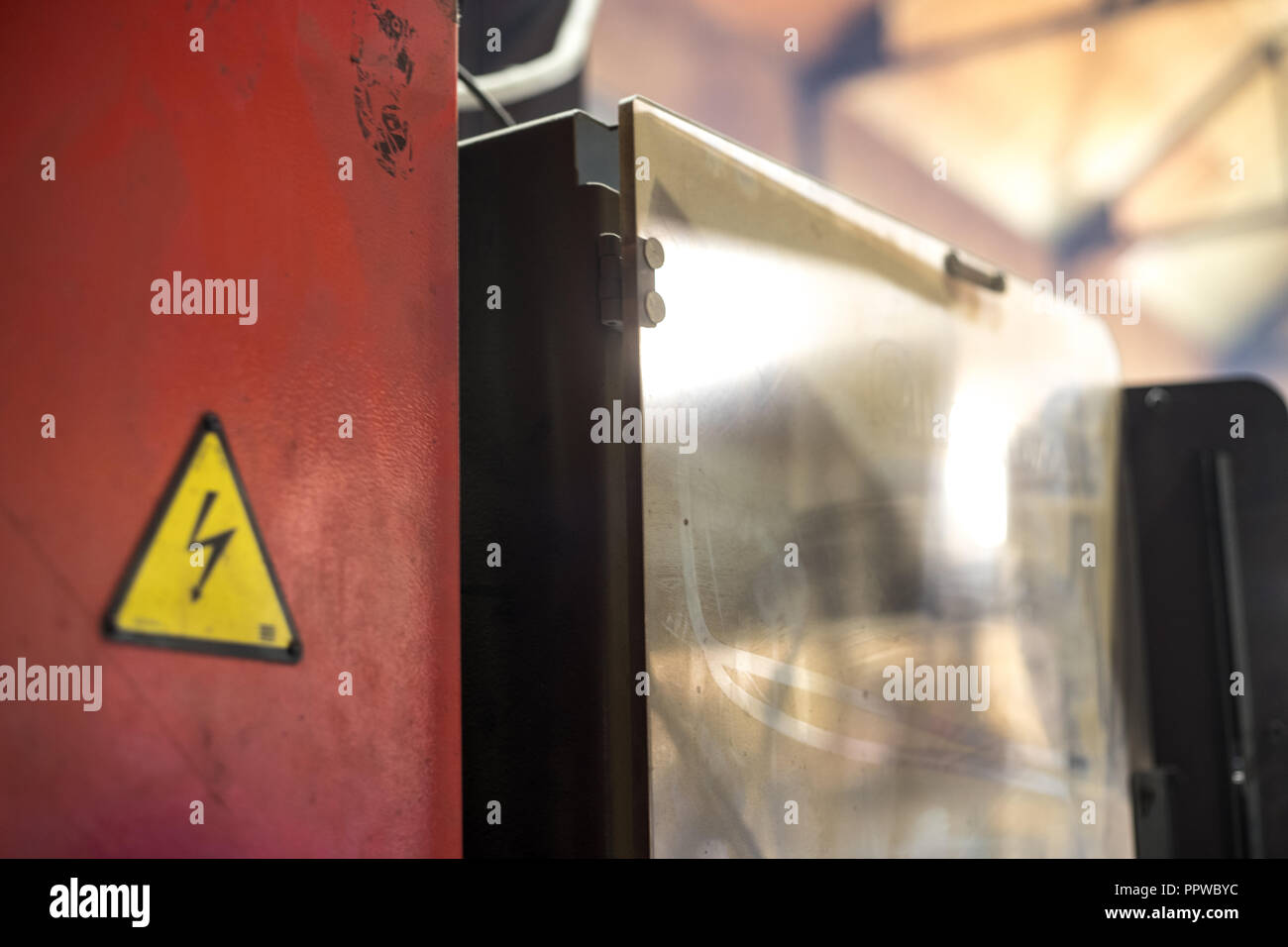 High voltage sign on the transformer door at the metallurgical factory ...