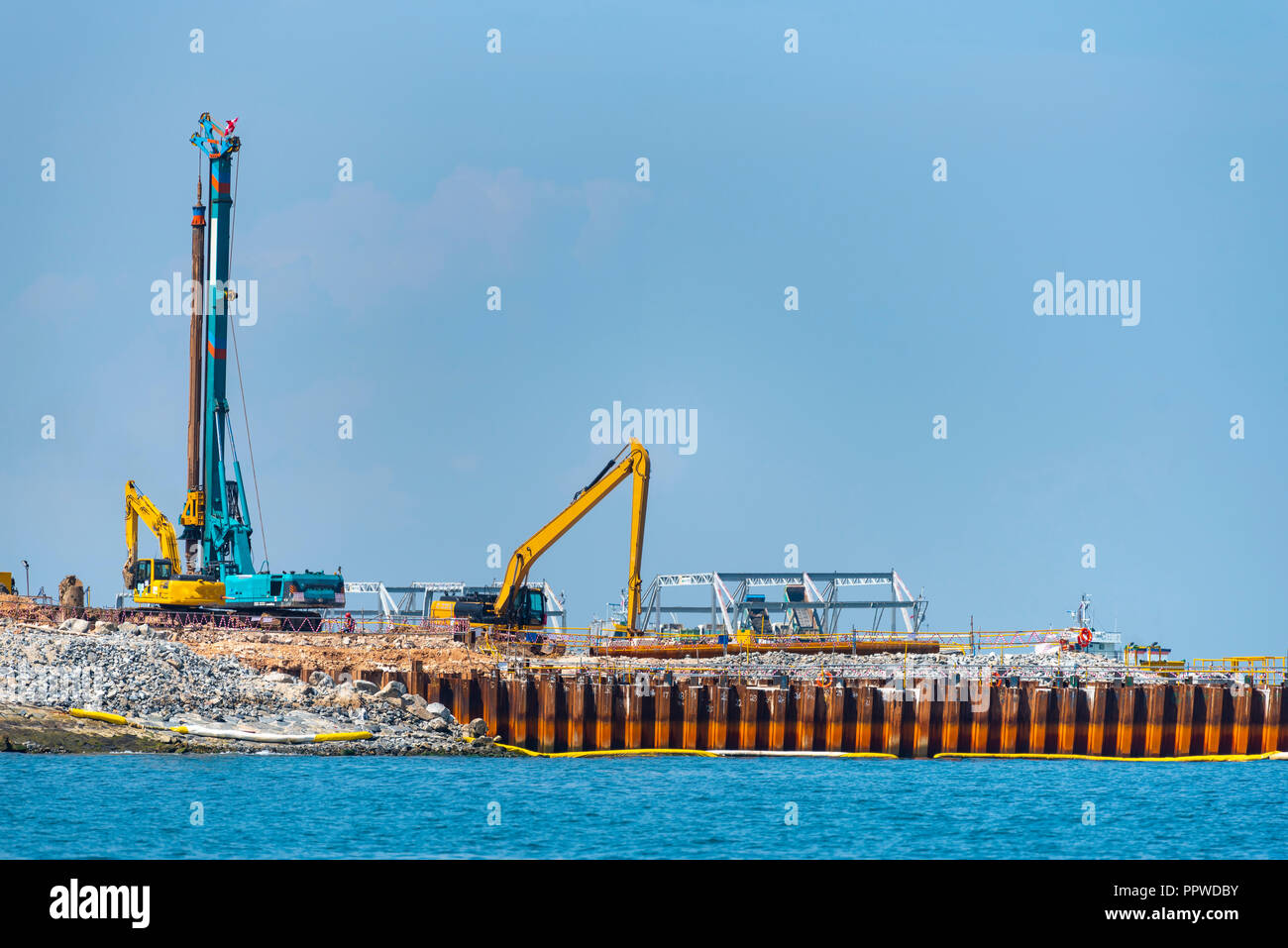 Port construction for industry in Singapore Stock Photo - Alamy