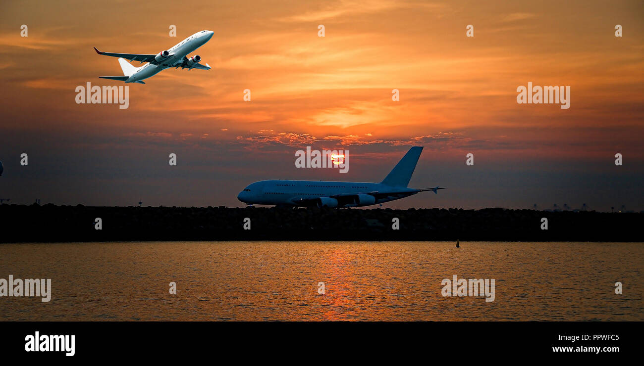 A colourful Sunset Seascape with an airborne passenger jet airliner ...