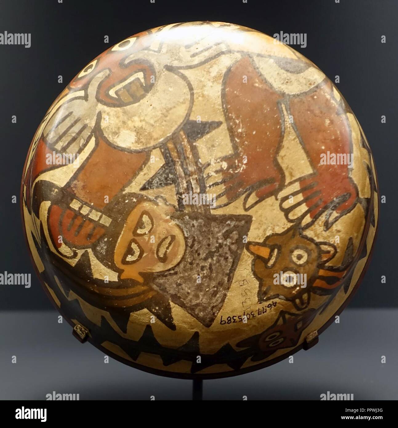 Bowl with mythical being holding a trophy head, Nasca, Peru, South ...