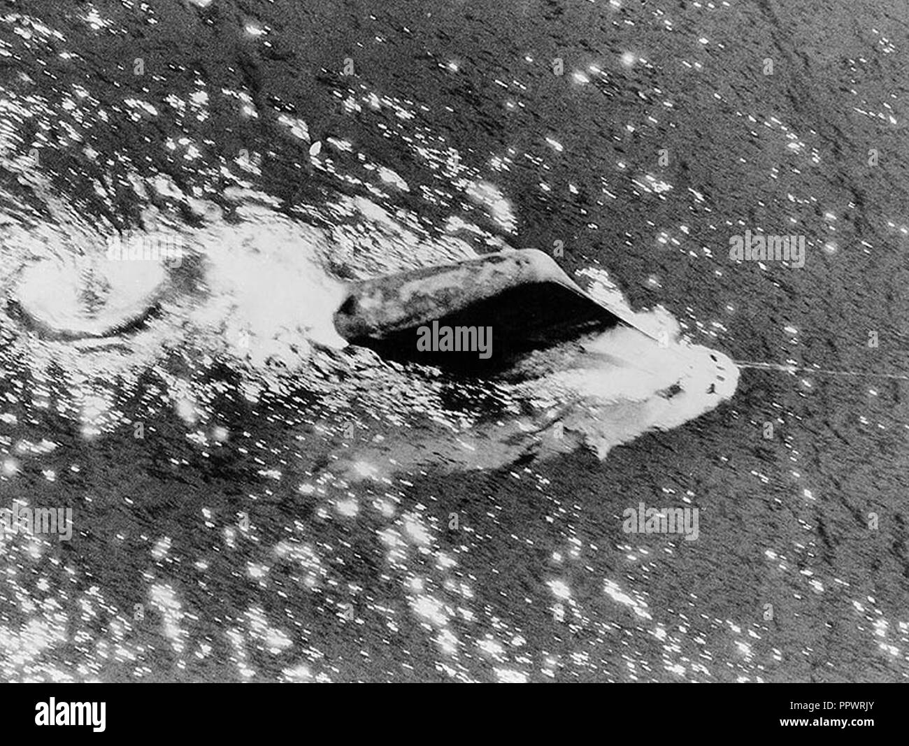 Bow of USS Pittsburgh (CA-72) under tow toward Guam in June 1945 Stock ...
