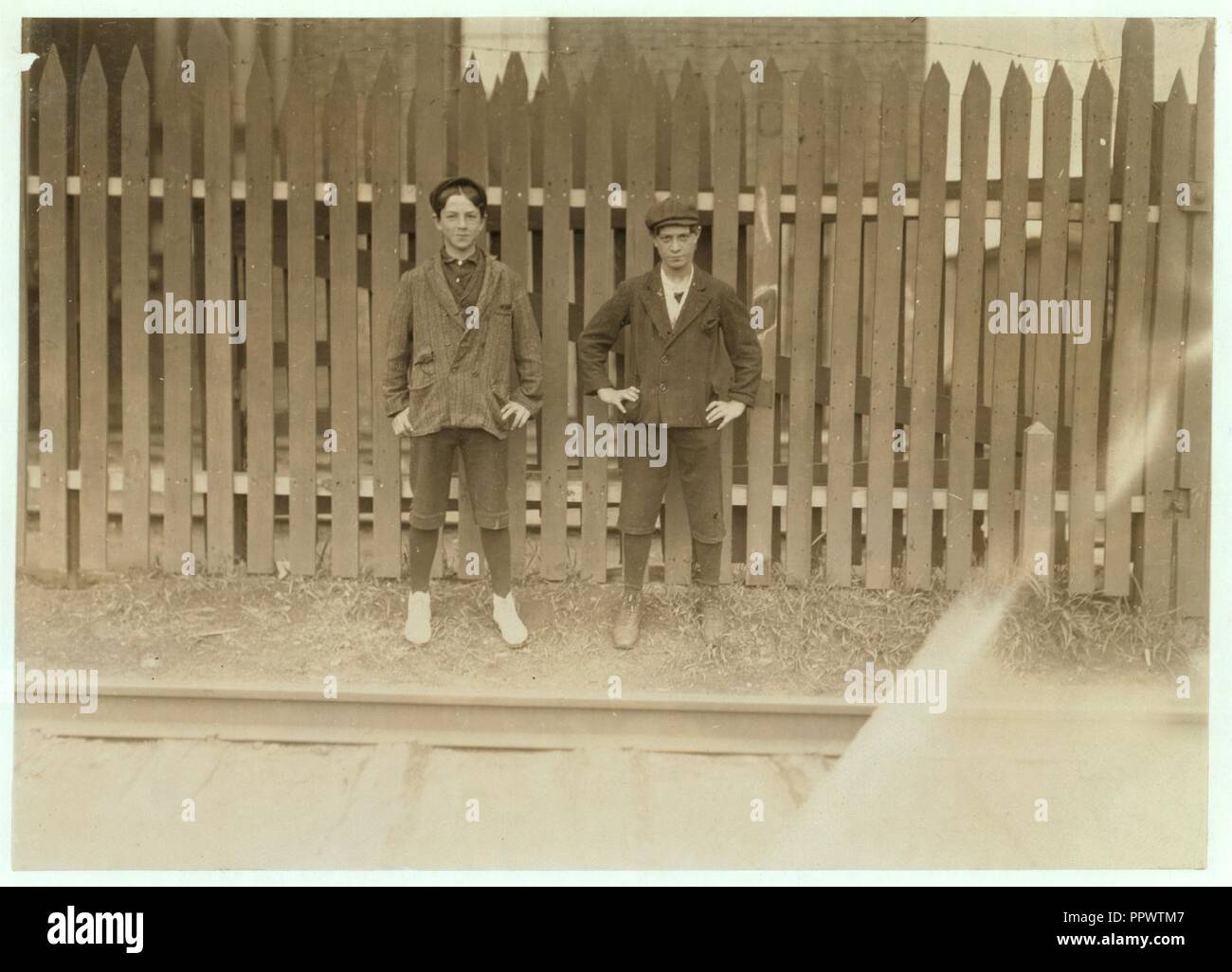 Boys working in Great Falls Mfg. Co., Somersworth, N.H. Boy on right ...