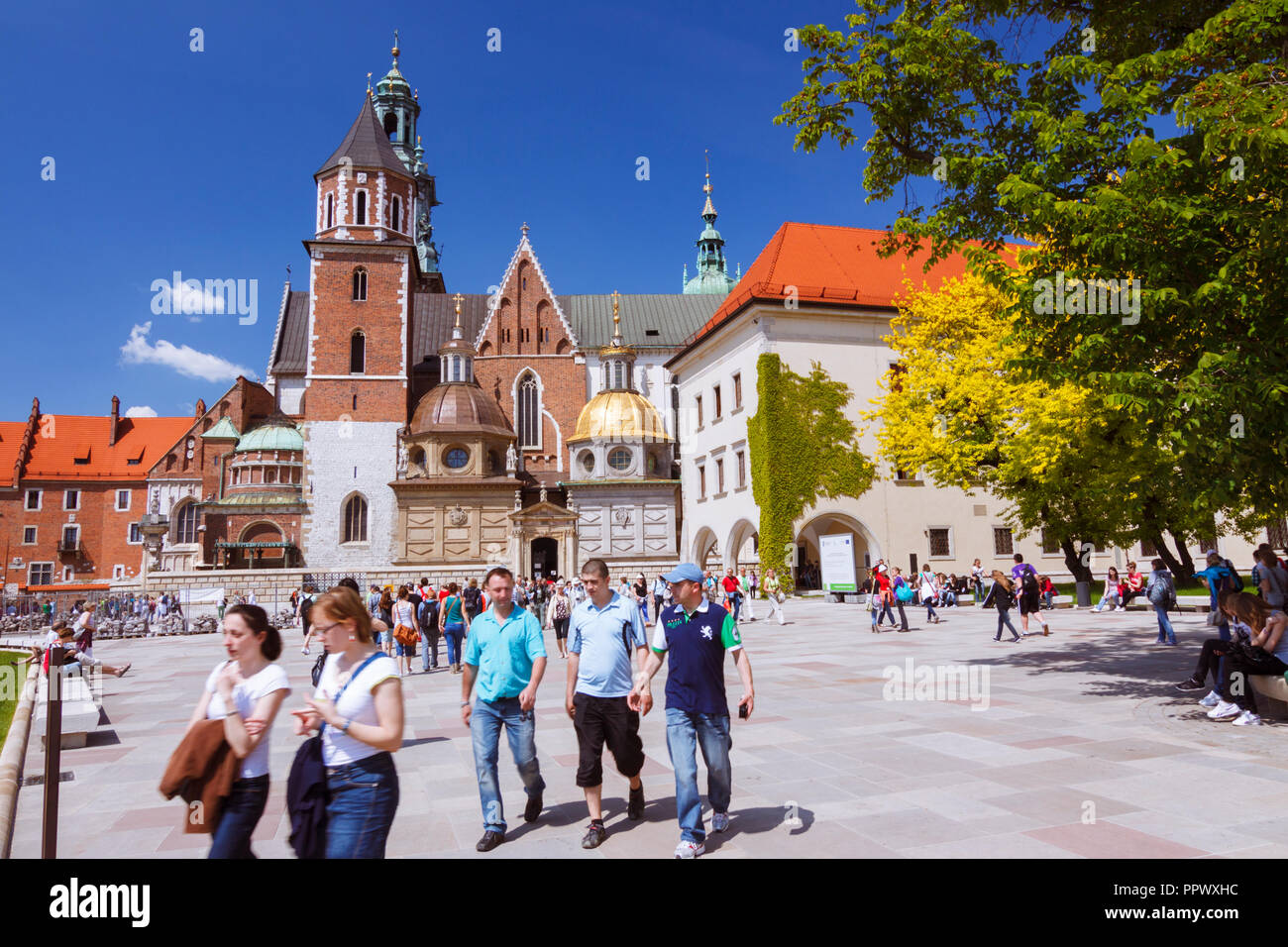 Krakow, Poland : Tourists walk around Wawel Cathedral on the Wawel Hill ...