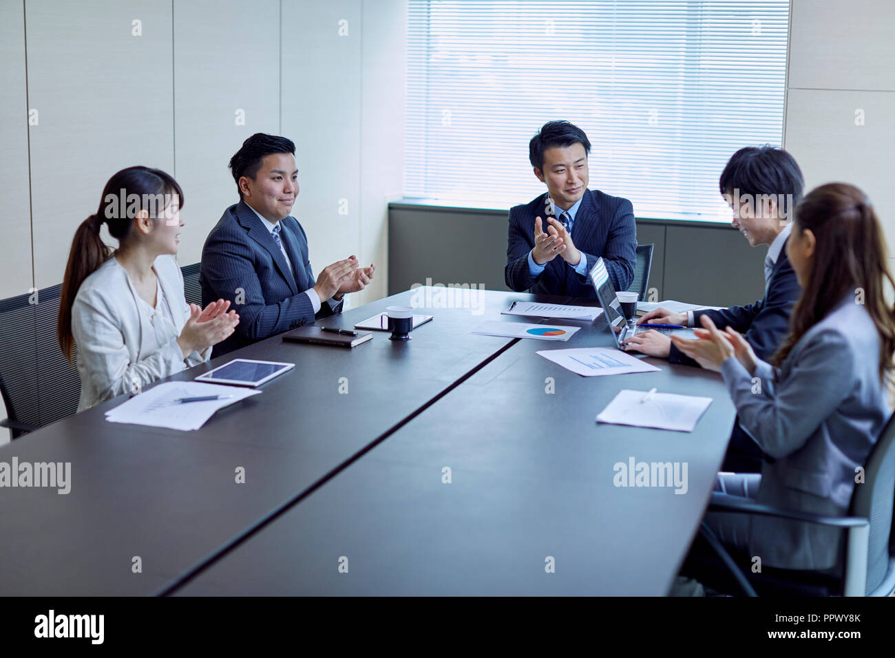 Japanese businesspeople in a meeting Stock Photo - Alamy