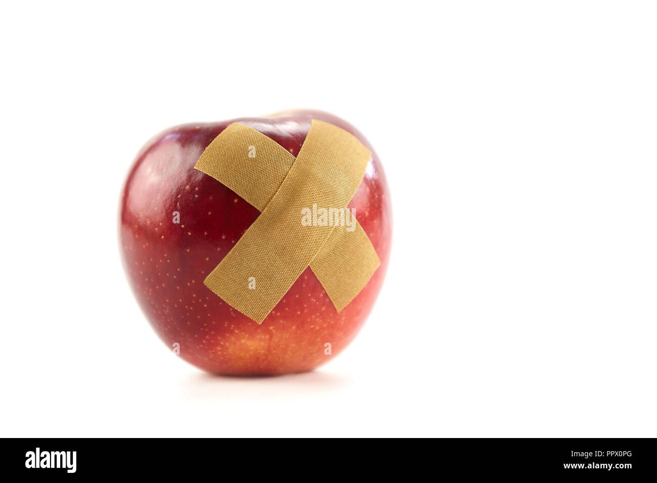 red apple with bandage isolated on white background Stock Photo - Alamy