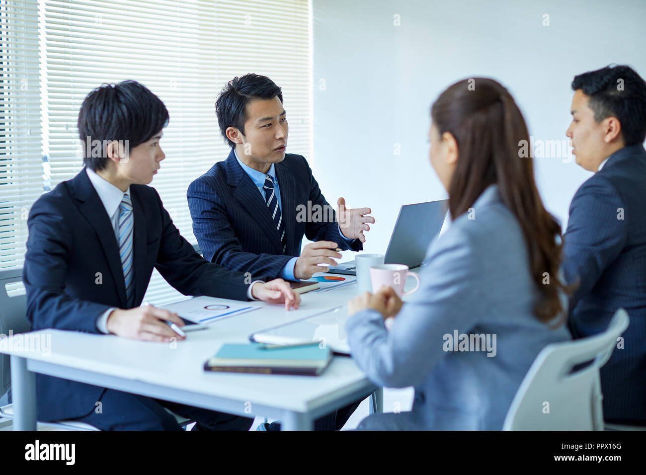 Japanese businesspeople in a meeting Stock Photo - Alamy