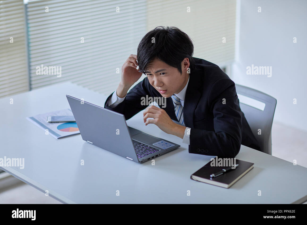 Japanese businessman in the office Stock Photo - Alamy