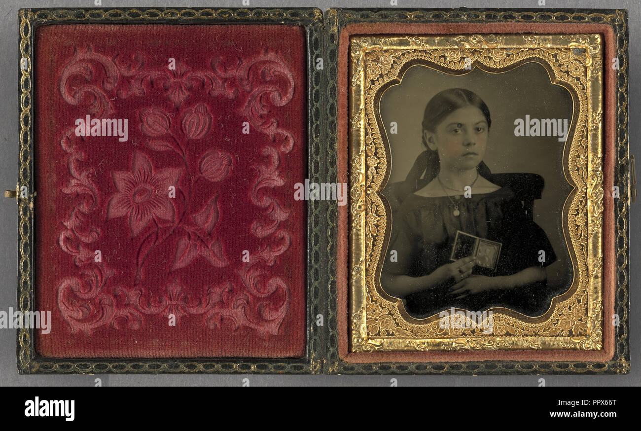 Girl holding locket hi-res stock photography and images - Alamy